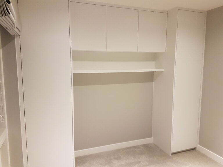 Overbed fitted wardrobes and storage units, bespoke overhead storage