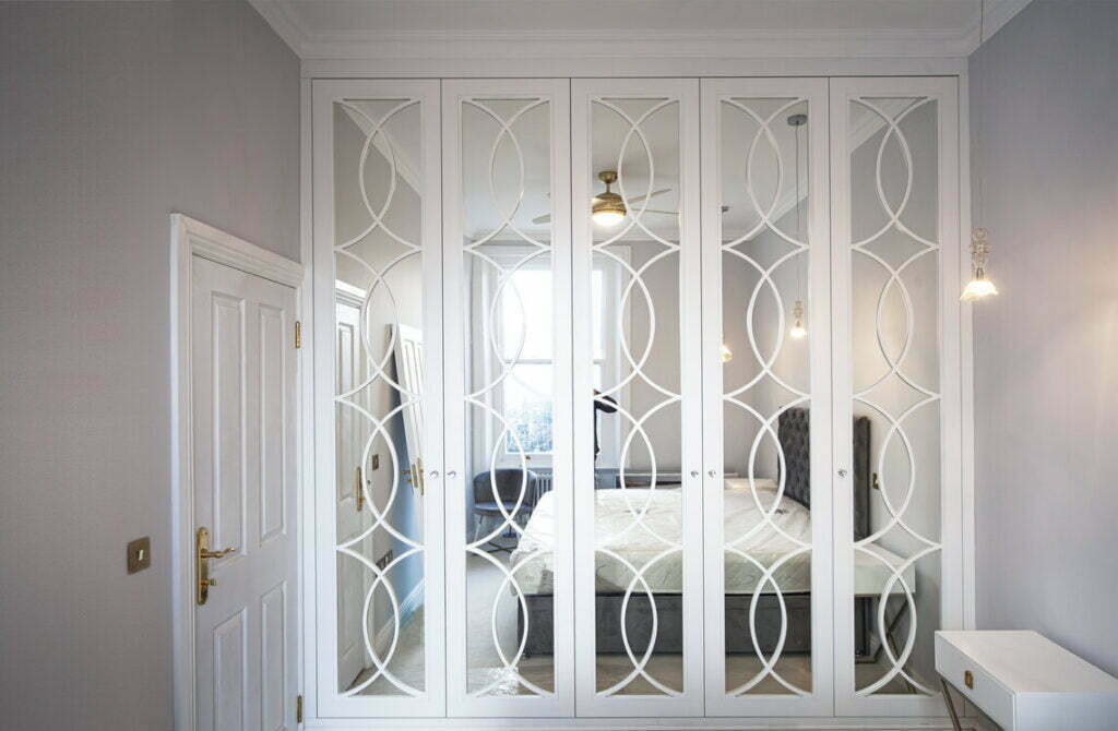 Luna circular fretwork lattice fitted wardrobe doors with mirrors London