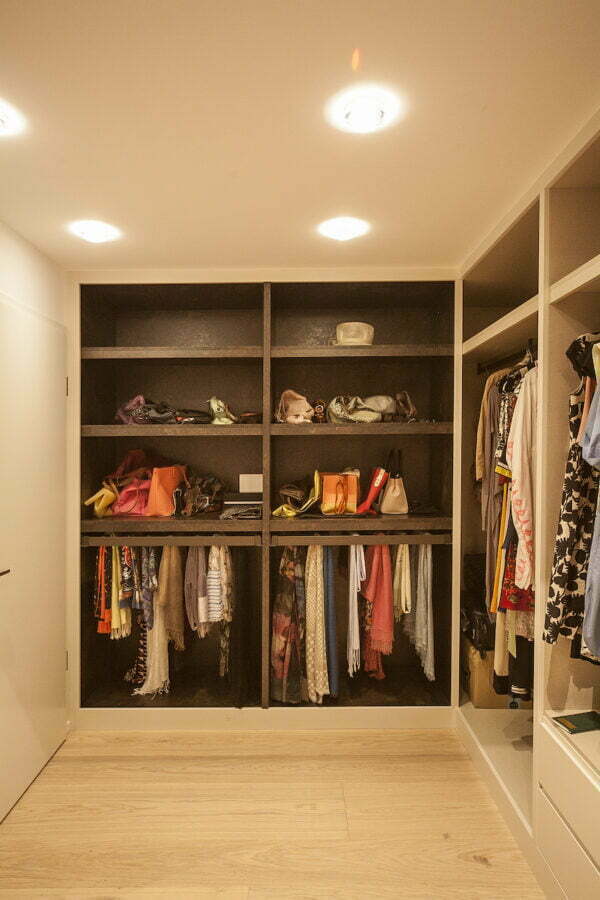 Walk in wardrobe with lacquered drawer fronts, bespoke dressing room London