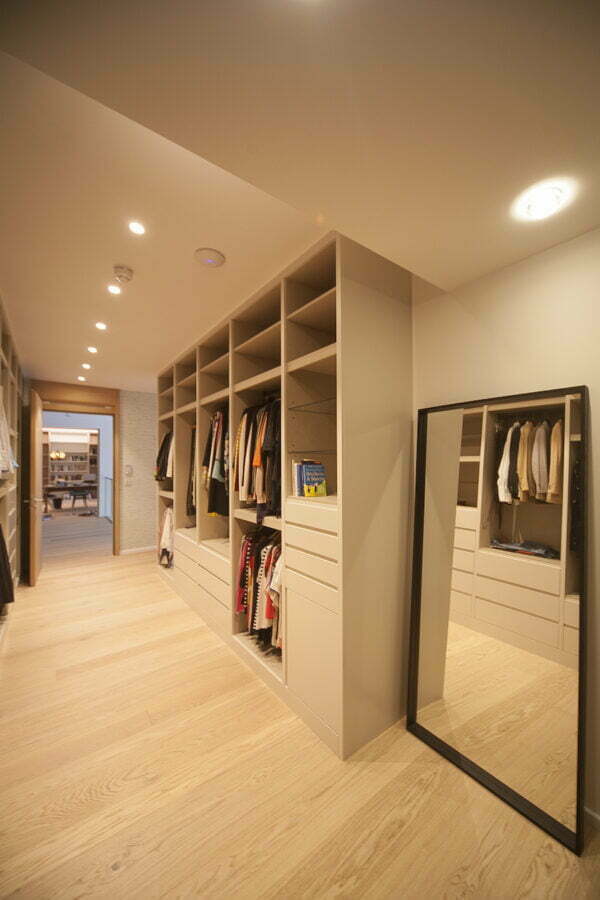 Walk in wardrobe with lacquered drawer fronts, bespoke dressing room London