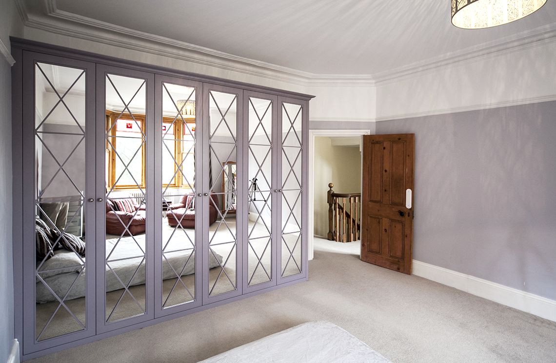 Lacquered mirrored doors with lattice fretwork pattern | Urban Wardrobes