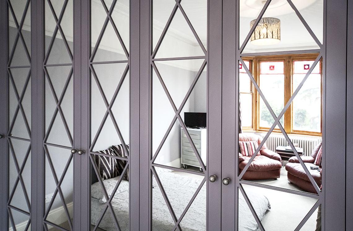 Lacquered mirrored doors with lattice fretwork pattern | Urban Wardrobes