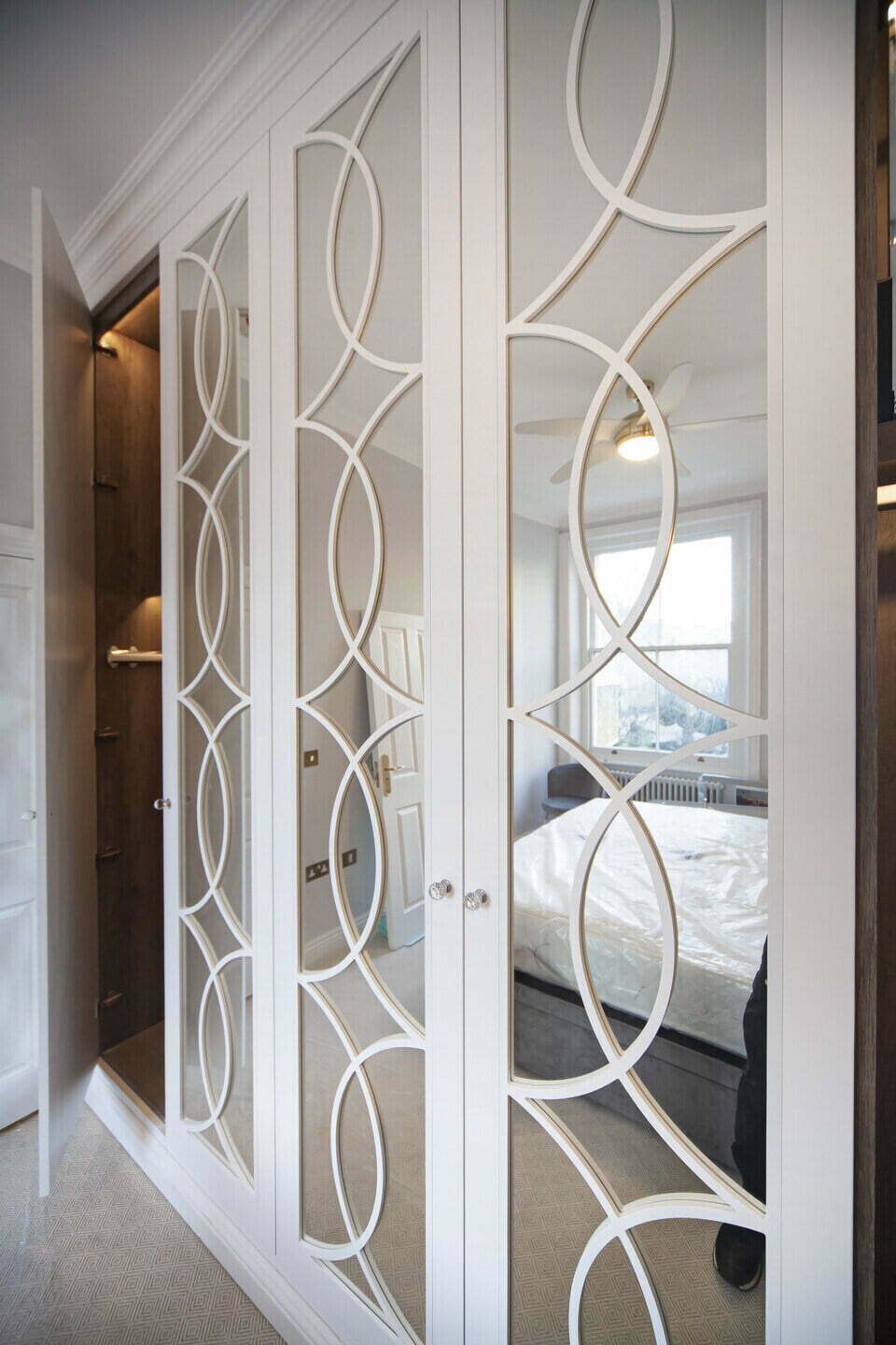 Luna fretwork fitted mirrored wardrobes, bespoke cabinet South Kensington