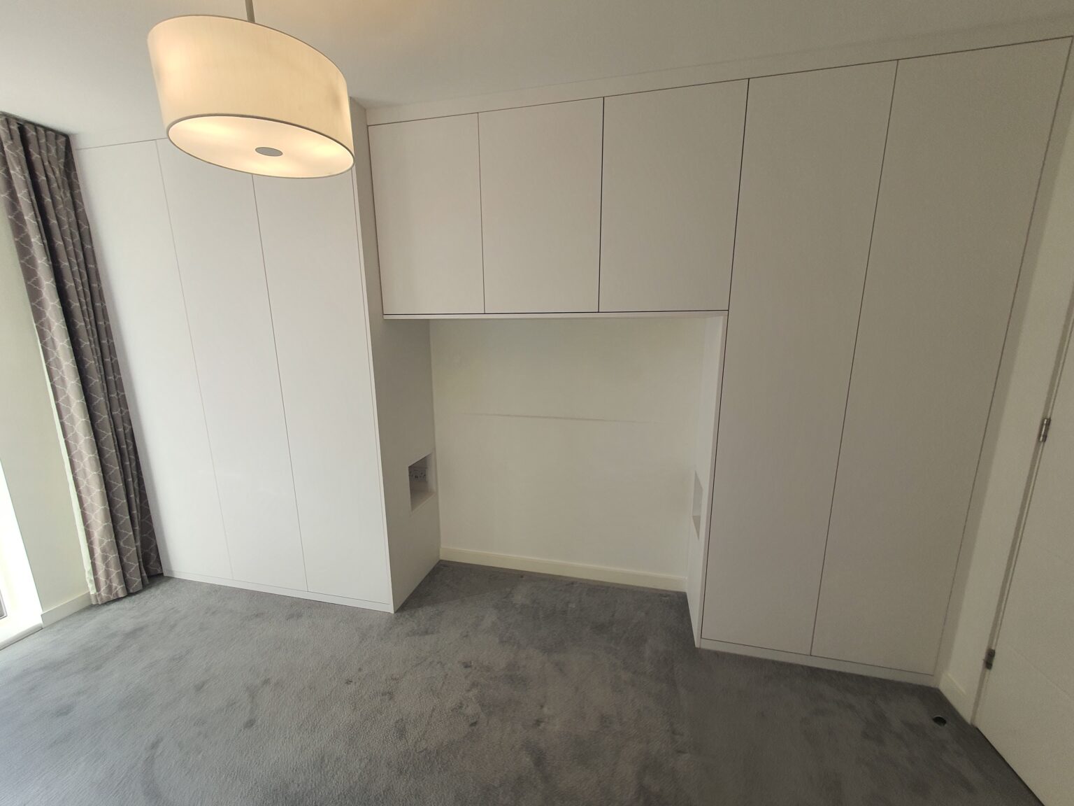 Overbed fitted wardrobes and storage units, bespoke overhead storage