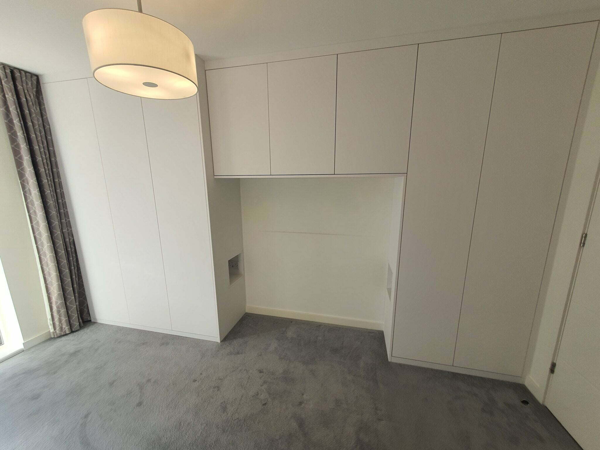 Overbed fitted wardrobes and storage units, bespoke overhead storage