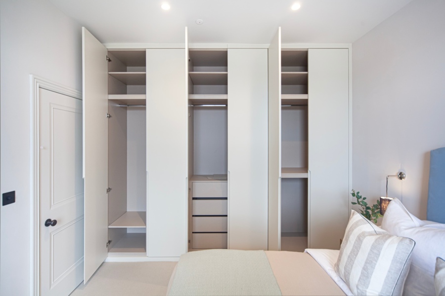 Made to measure fitted wardrobe with sprayed lacquered MDF doors and ...