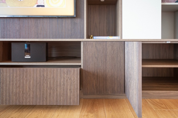 Bespoke fluted oak TV unit, ribbed design, slatted door and back panel ...